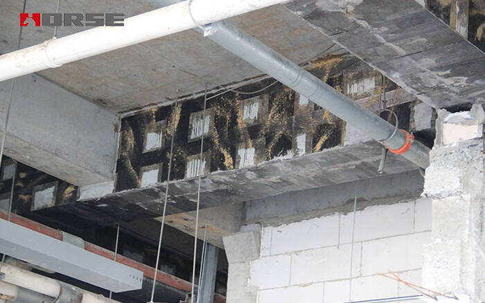 FRP Repair of Corrosion-Damaged Reinforced Concrete Beams